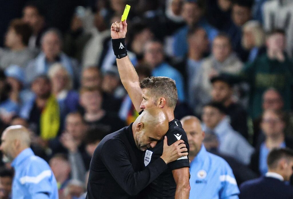 Pep Guardiola Hilariously Hugs Referee After Being Shown Yellow Card ...